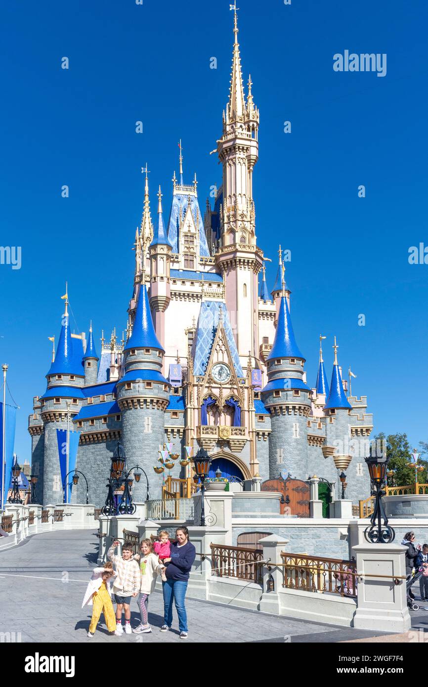 Family by Cinderella's Castle, Fantasyland, Magic Kingdom, Walt Disney ...