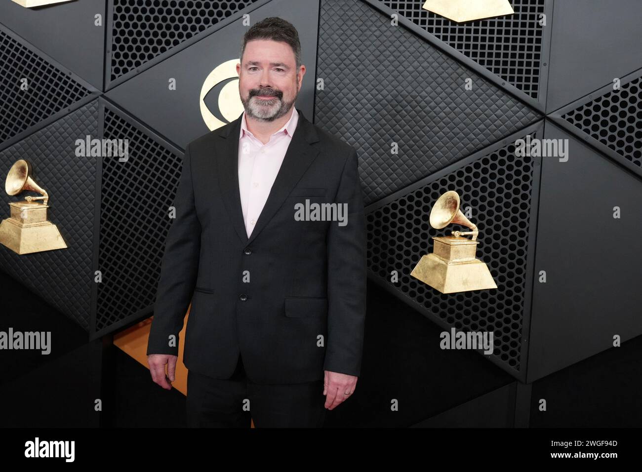 Mike Powers arrives at the 66th annual Grammy Awards on Sunday, Feb. 4 ...