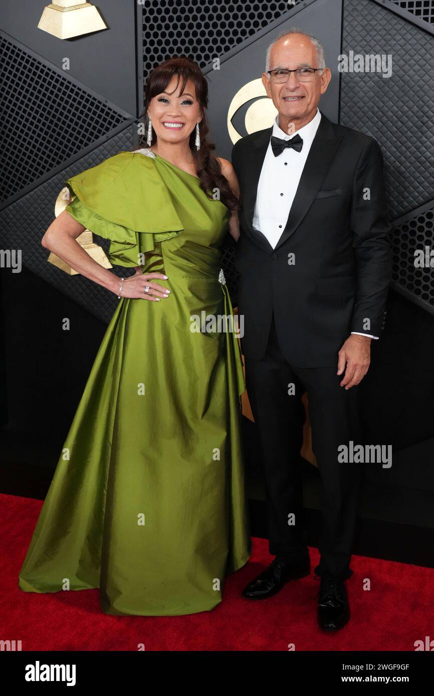 Mimy Succar, left, and Antonio Succar arrive at the 66th annual Grammy ...