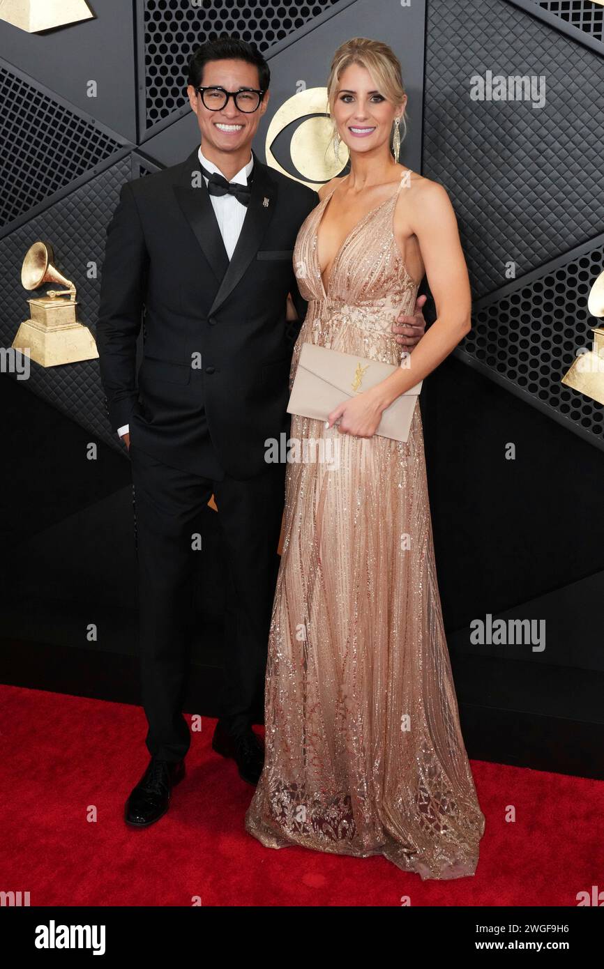 Tony Succar, left, and Lauren Succar arrive at the 66th annual Grammy ...