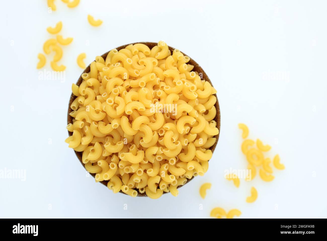 Top View Raw Dried Macaroni Pasta in A Bowl, Isolated on White Stock ...