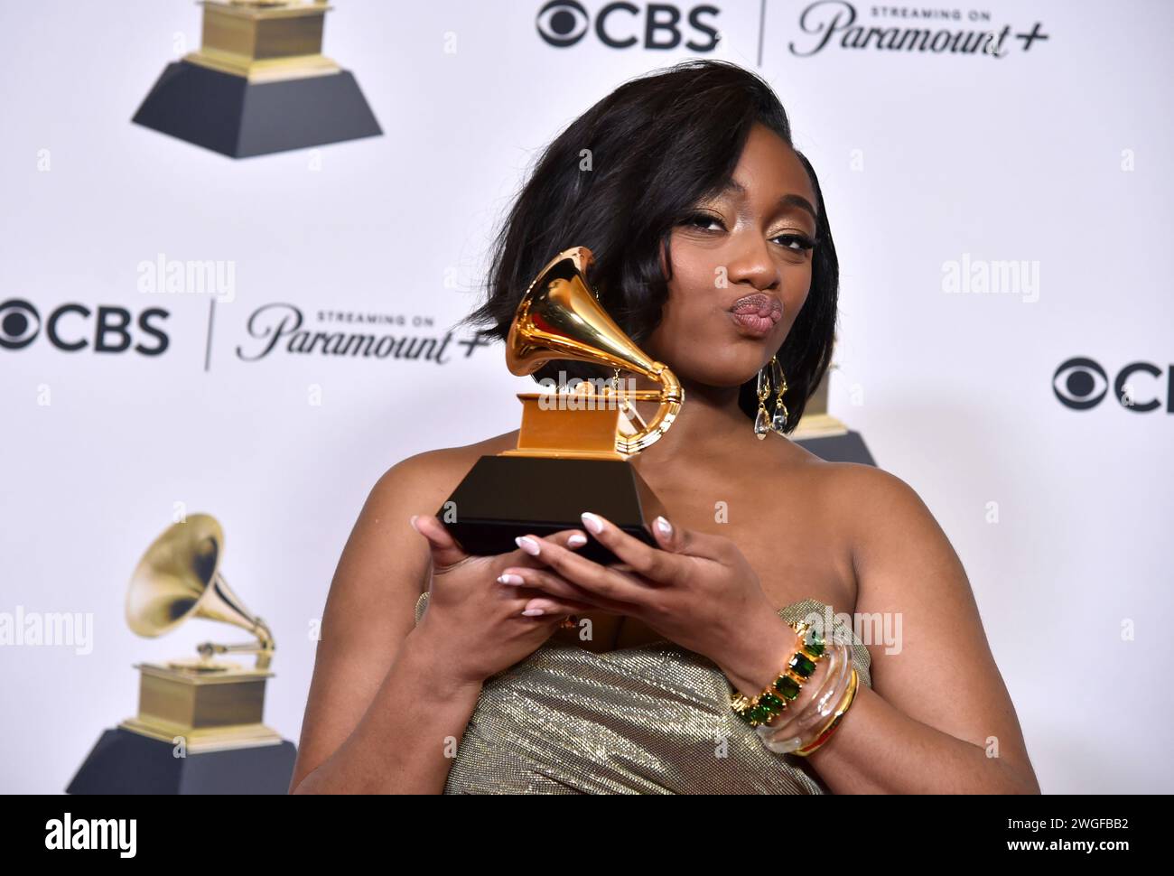 Samara Joy poses in the press room with the award for best jazz ...