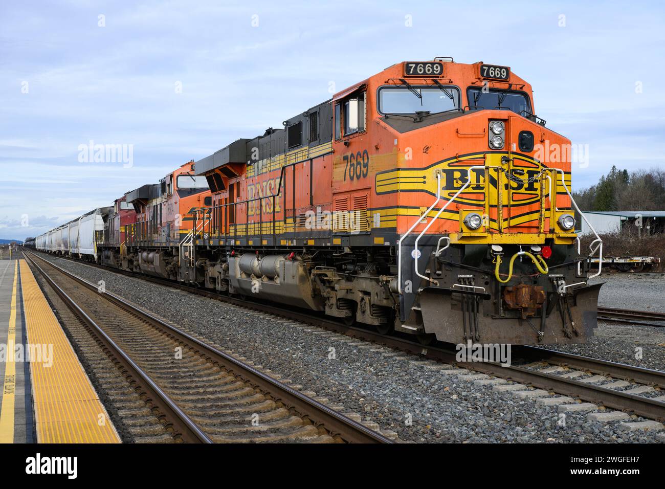 Stanwood, WA, USA - February 2, 2024; BNSF train with mixed freight ...