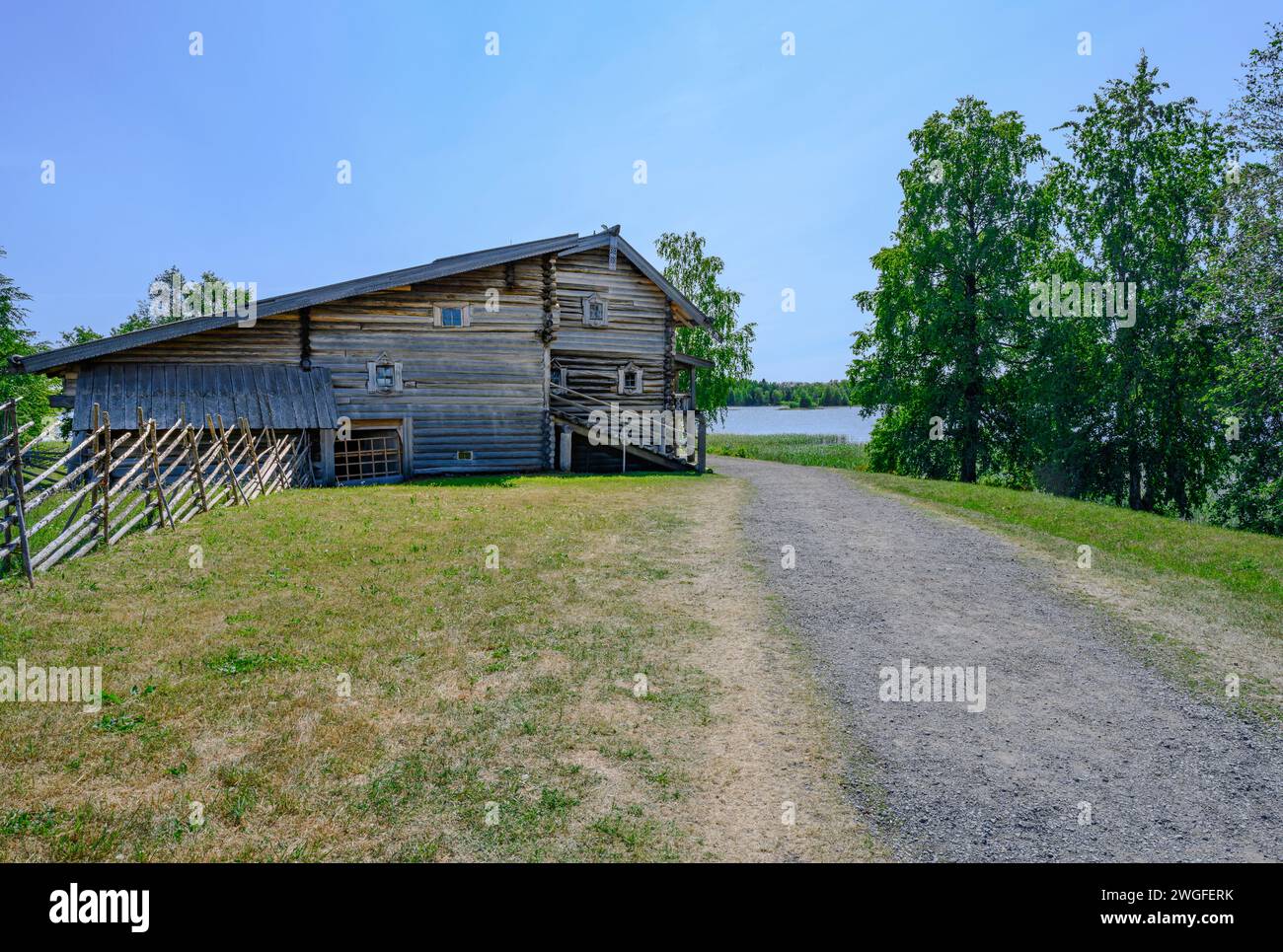 Wooden house of the 19th century with carved platbands on the windows ...