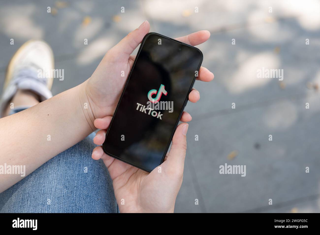 Chiang Mai, Thailand - Feb 02 2024: A close-up shot of a woman using ...
