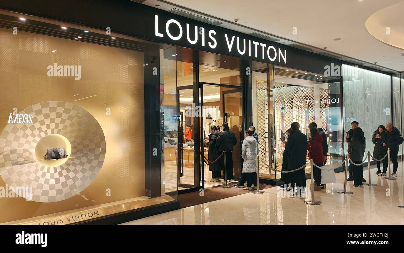 SHANGHAI, CHINA - FEBRUARY 3, 2024 - Customers line up at a store of ...