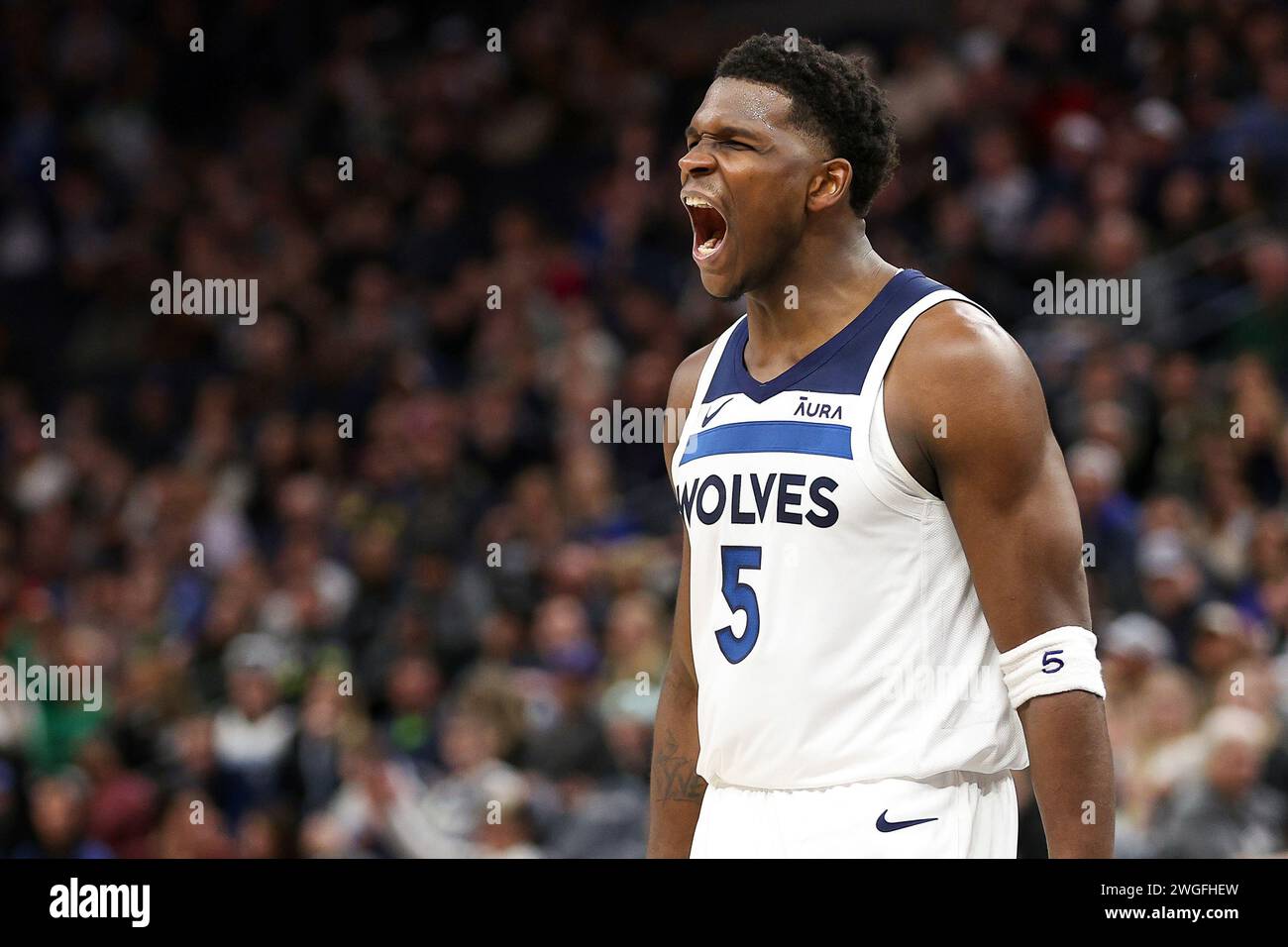 Minnesota Timberwolves guard Anthony Edwards celebrates after drawing a ...