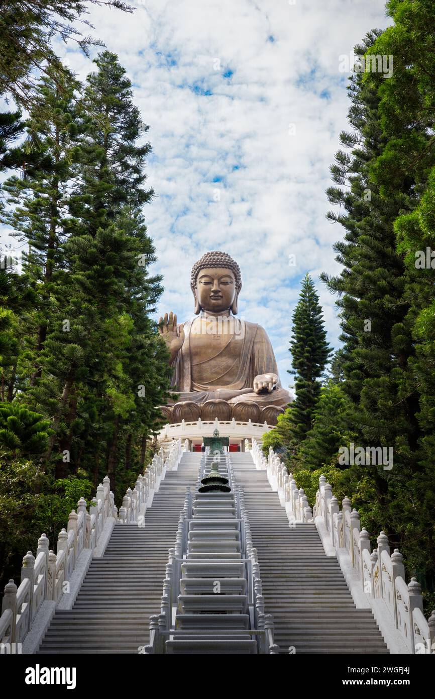 Large Buddha statue seated on steps Stock Photo - Alamy