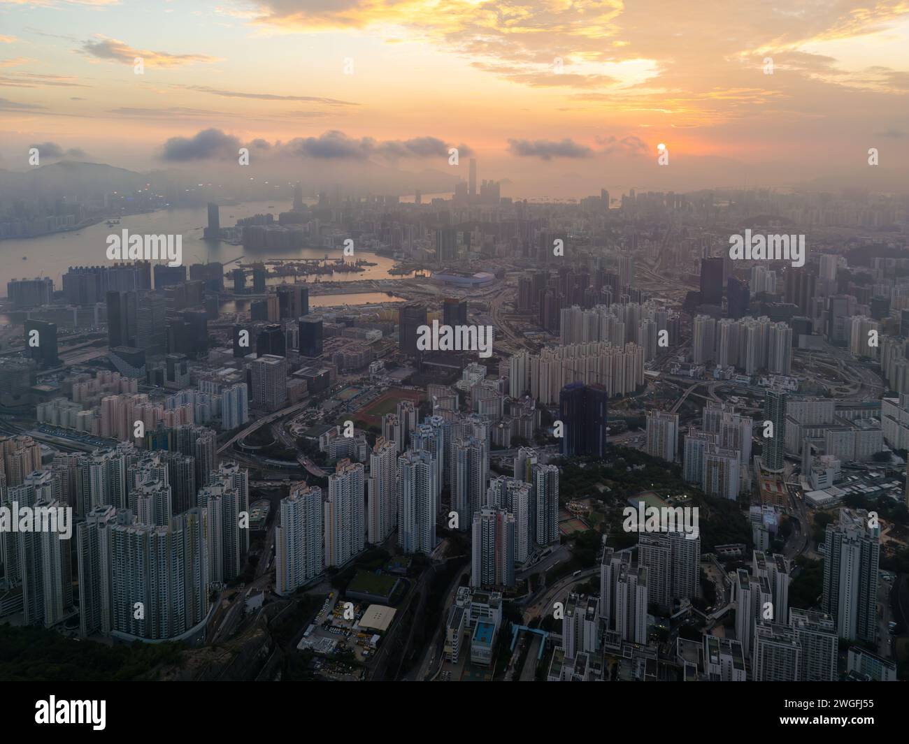 Wide city skyline with blue sky backdrop Stock Photo - Alamy