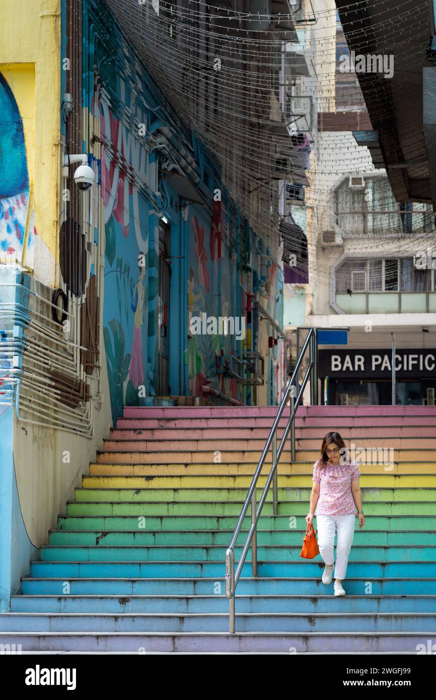 Female walking stairs hi-res stock photography and images - Alamy