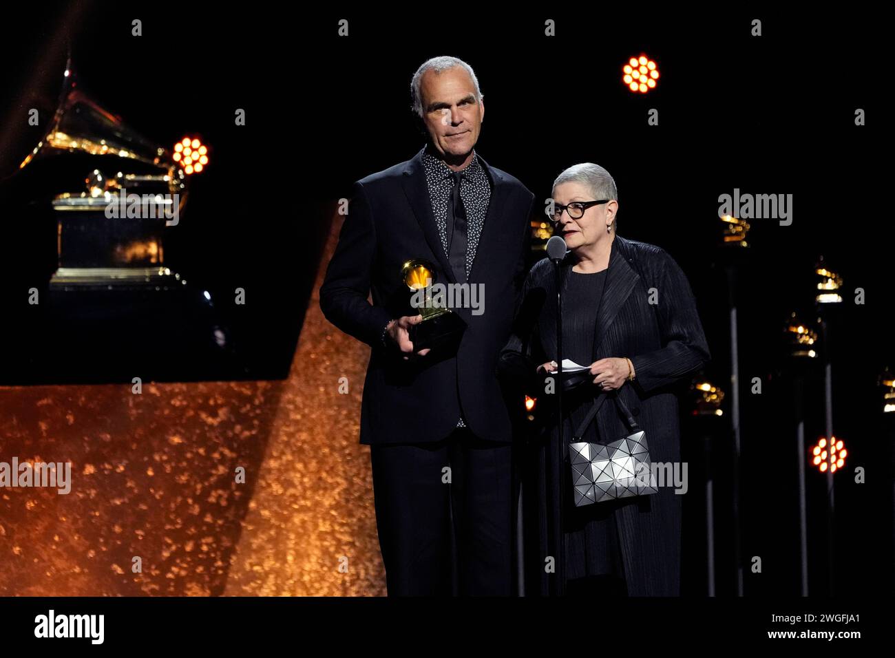 John Heiden, left, and Jeri Heiden accept the award for best boxed or ...