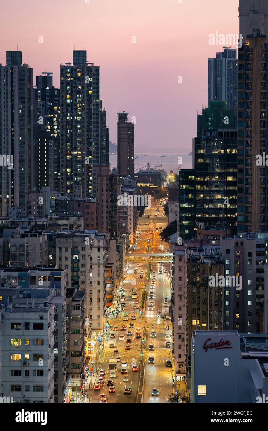 The illuminated traffic on the streets of Hong Kong alongside the ...