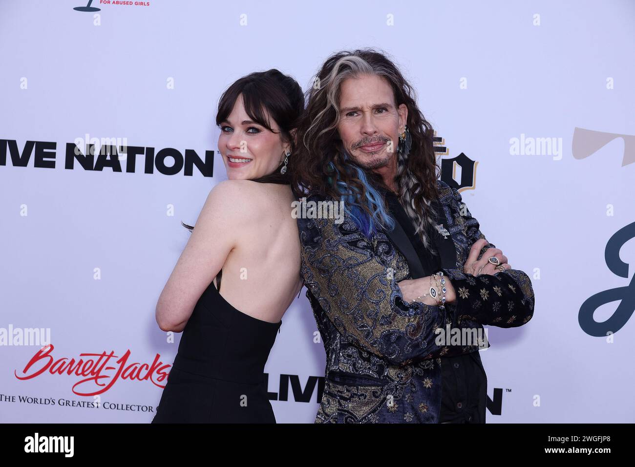Hollywood, USA. 04th Feb, 2024. Zooey Deschanel and Steven Tyler attend ...