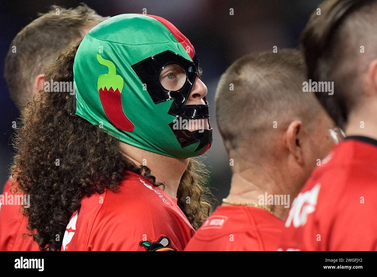 Mexico's Wilmer Rios wears a mask as he sings the Mexican National ...