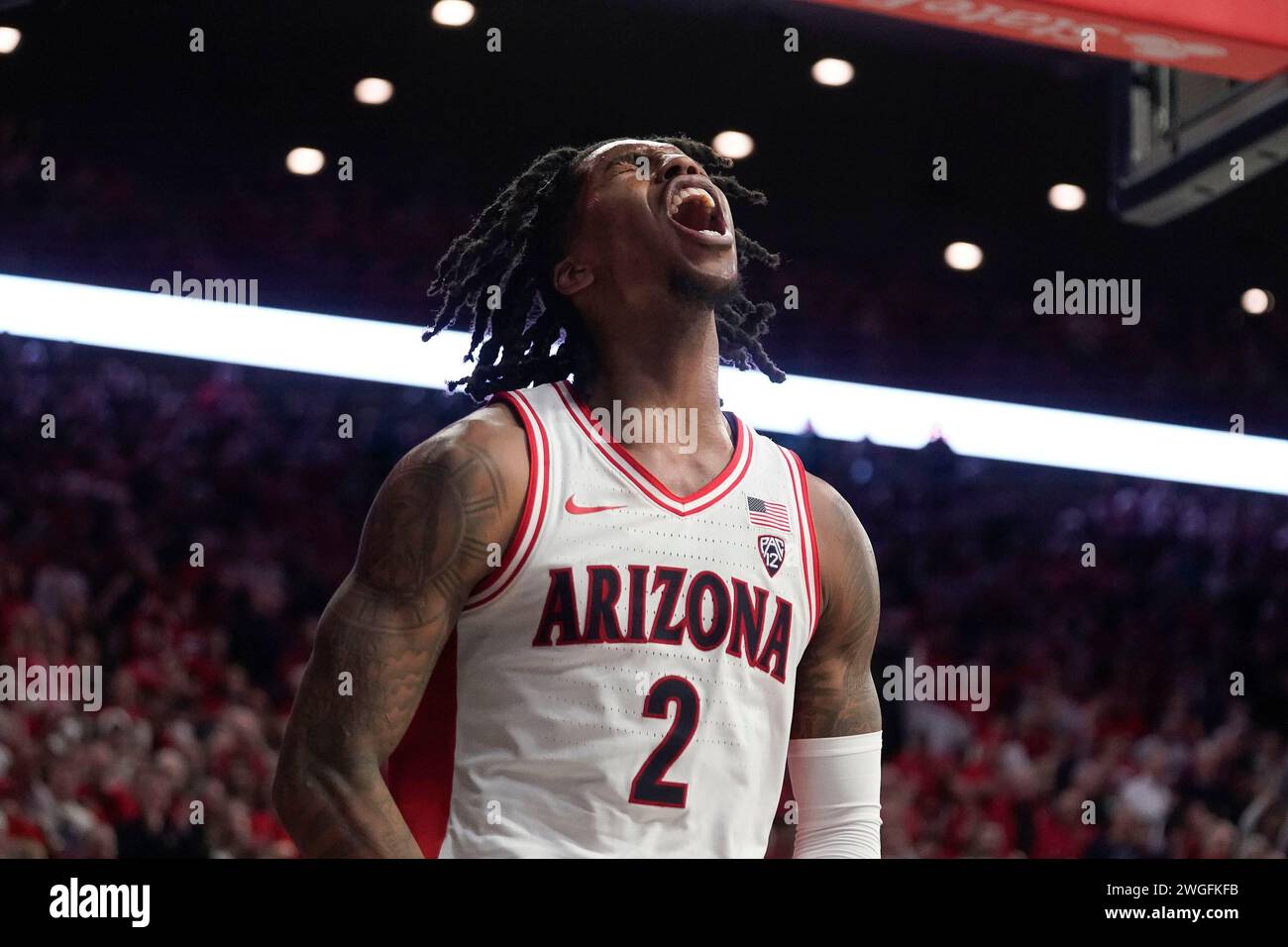Arizona's Caleb Love celebrates his team's first lead and a foul ...