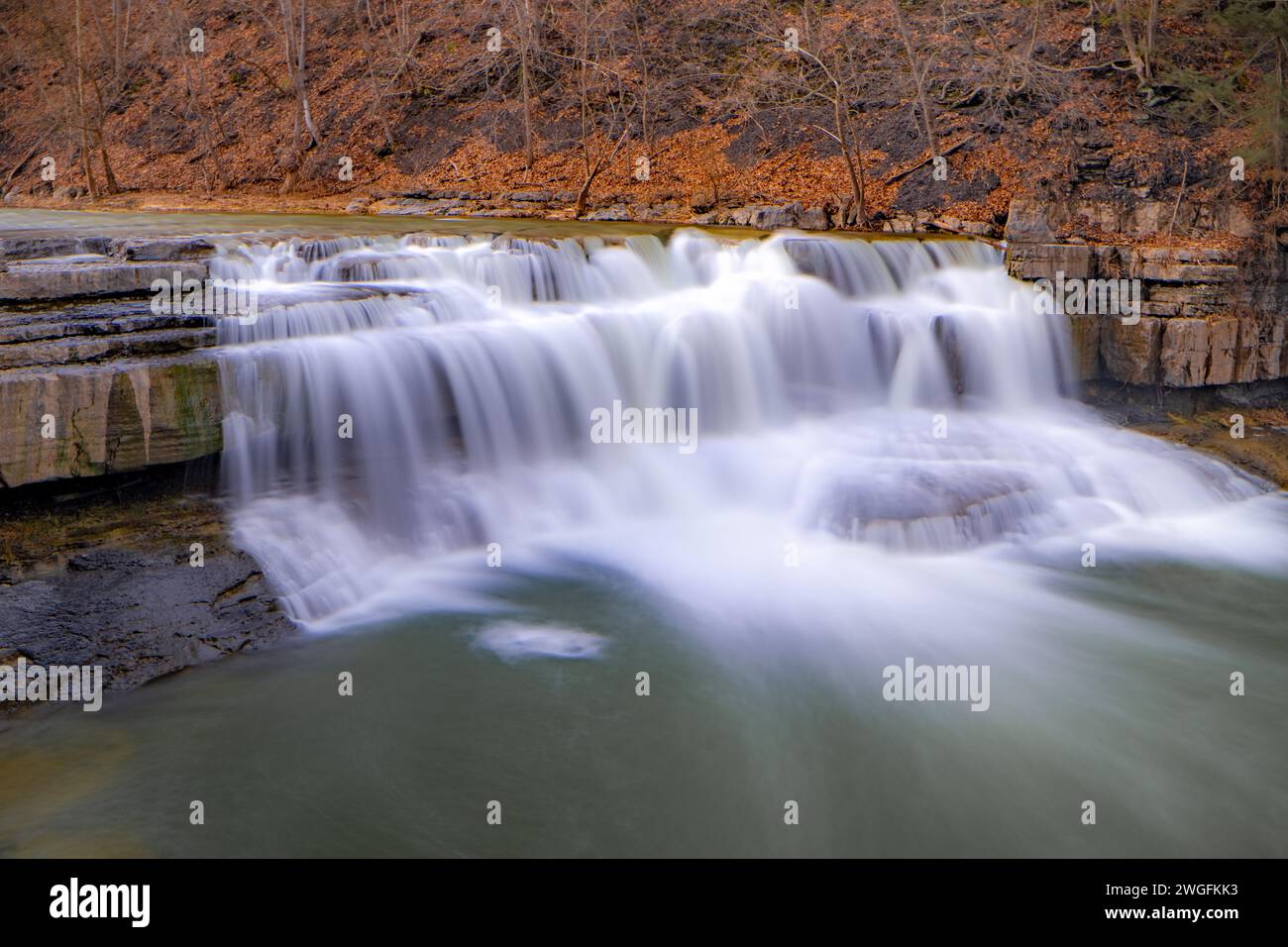 Long exposure winter photo of the lower falls at Taughannock Falls ...