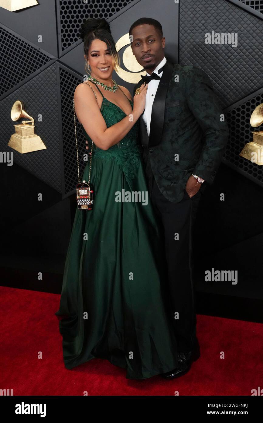 Kat Capone, left, and Kaleb Rollins arrive at the 66th annual Grammy ...