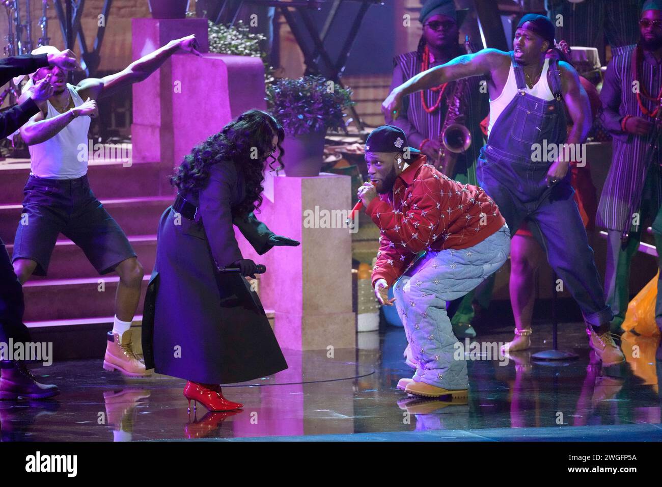 Brandy, left, and Burna Boy perform during the 66th annual Grammy ...