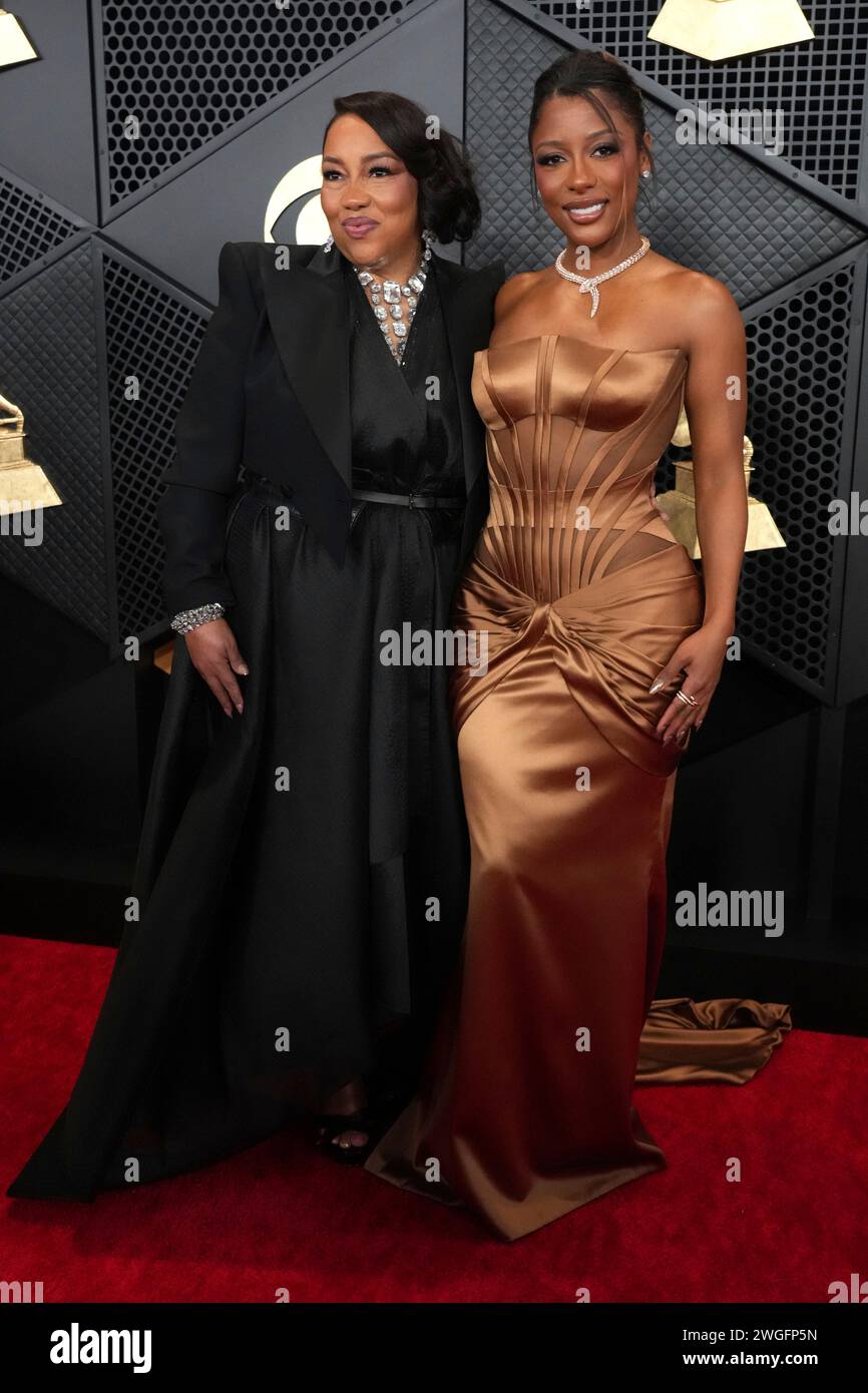L'Tanya Chestang-Cubit, left, and Victoria Monet arrive at the 66th ...