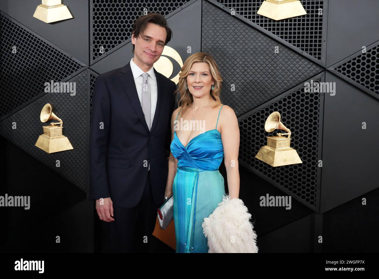 Marc Copley and Kristen Agresta-Copley arrive at the 66th annual Grammy ...