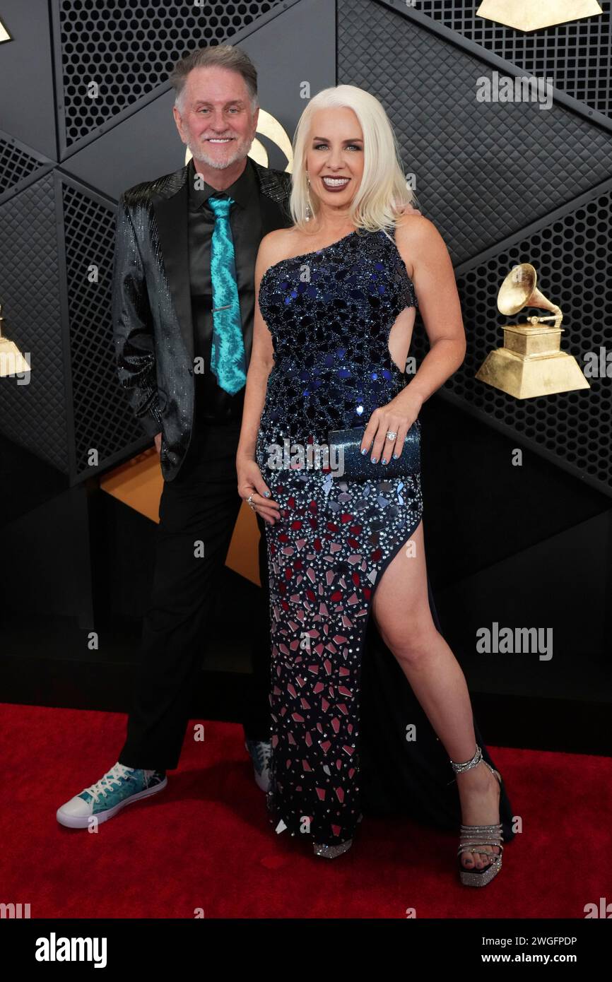 Gordon Goodwin and Vangie Gunn arrive at the 66th annual Grammy Awards ...