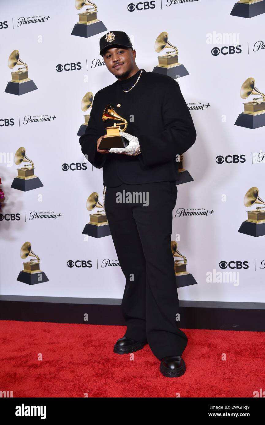 Khris Riddick-Tynes poses in the press room with the award for best R&B ...