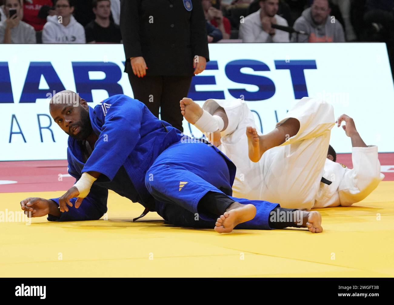 Paris, France. 04th Feb, 2024. Teddy Riner of France and KONE LOSSENI ...
