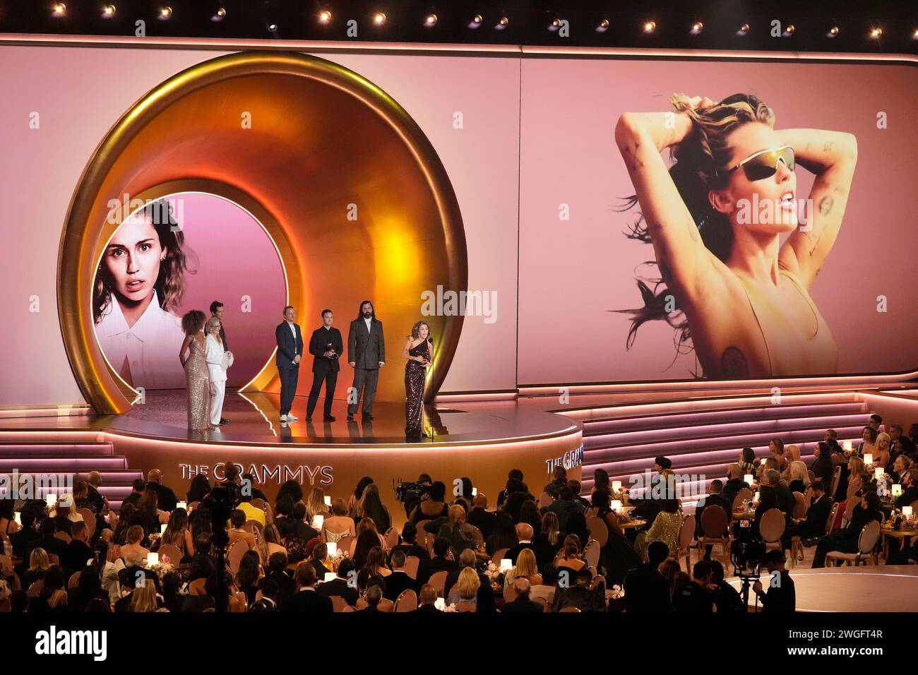 Miley Cyrus accepts the award for record of the year for "Flowers ...