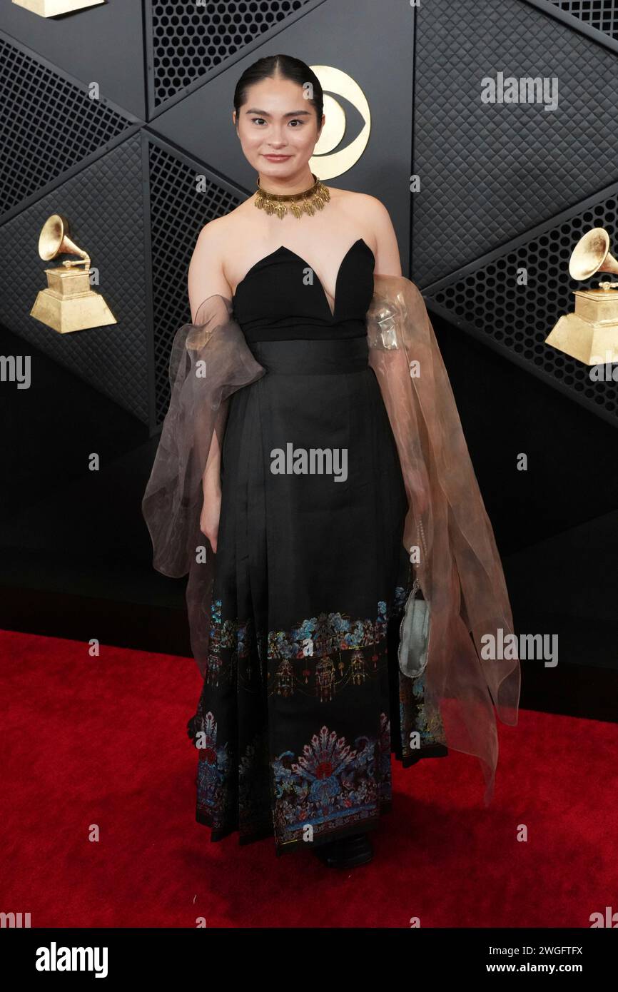Yang Tan arrives at the 66th annual Grammy Awards on Sunday, Feb. 4 ...