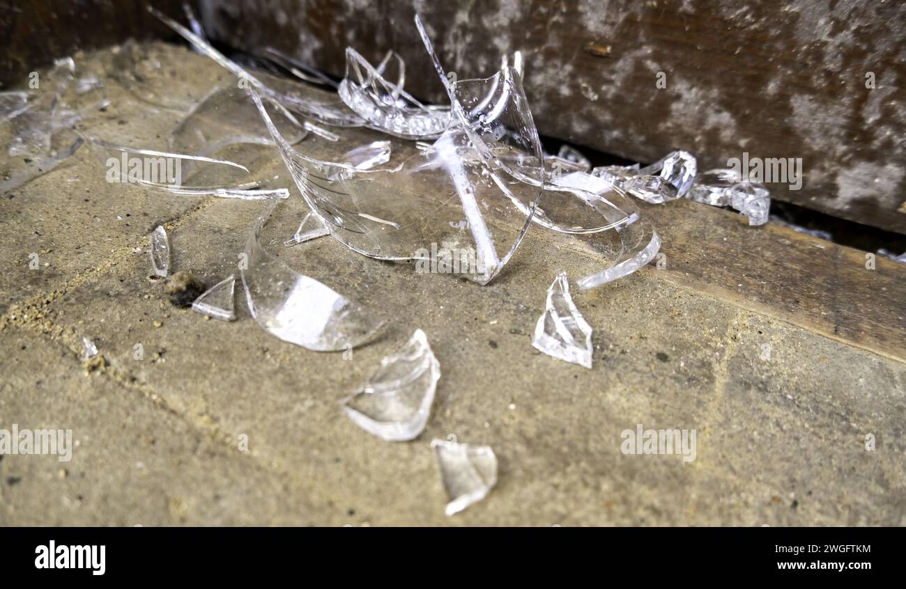 Detail of pieces of broken glass, vandalism and crime Stock Photo - Alamy