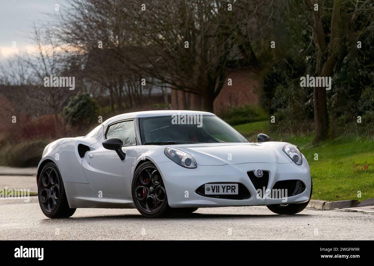 Milton Keynes,UK-Feb 4th 2024: 2016 white Alfa Romeo 4C classic car ...
