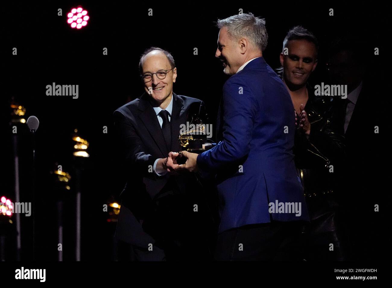 David Frost, left, and Charlie Post accept the award for best ...