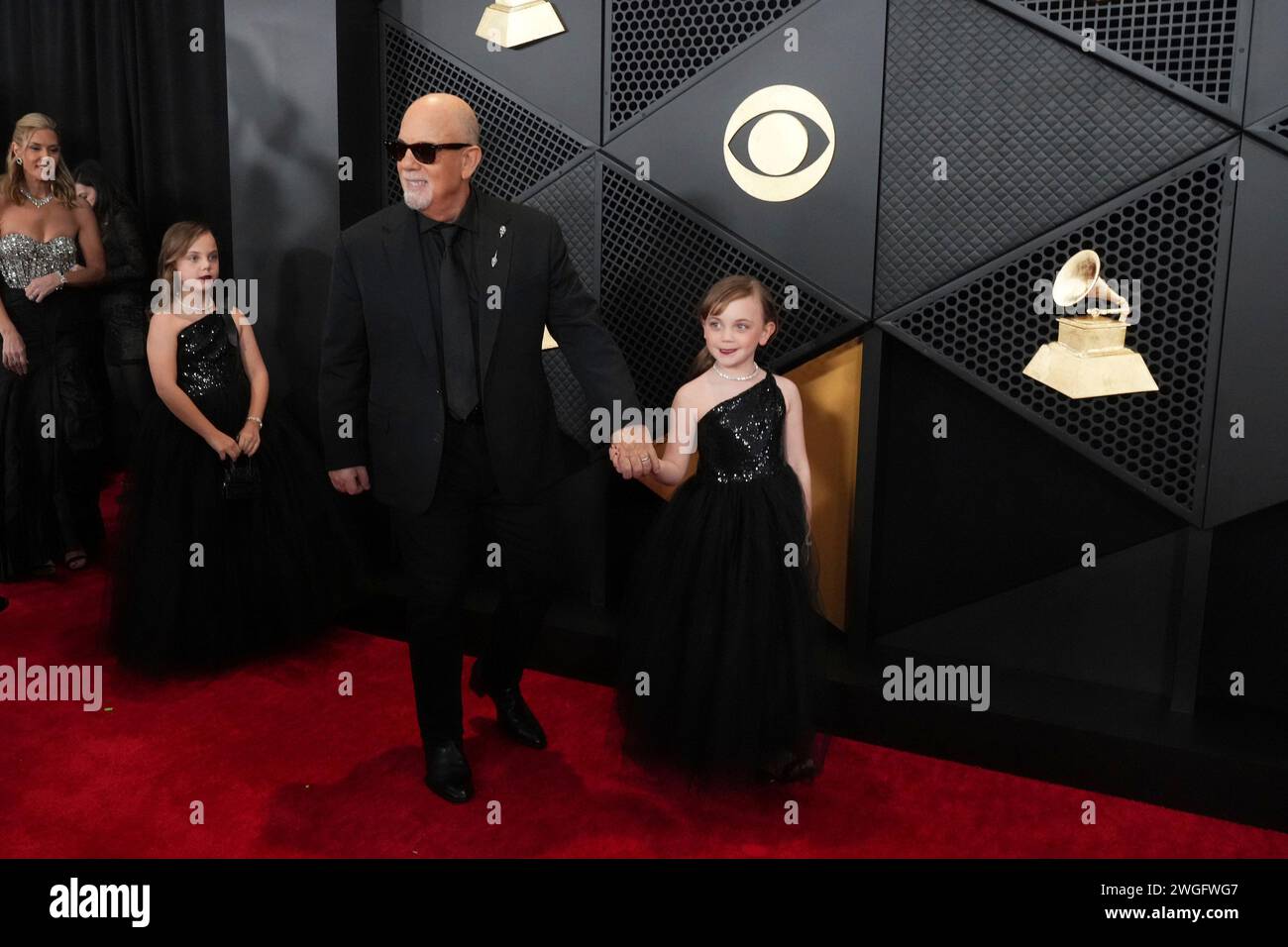 Alexis Joel, from left, Della Joel, Billy Joel, and Remy Joel arrive at ...