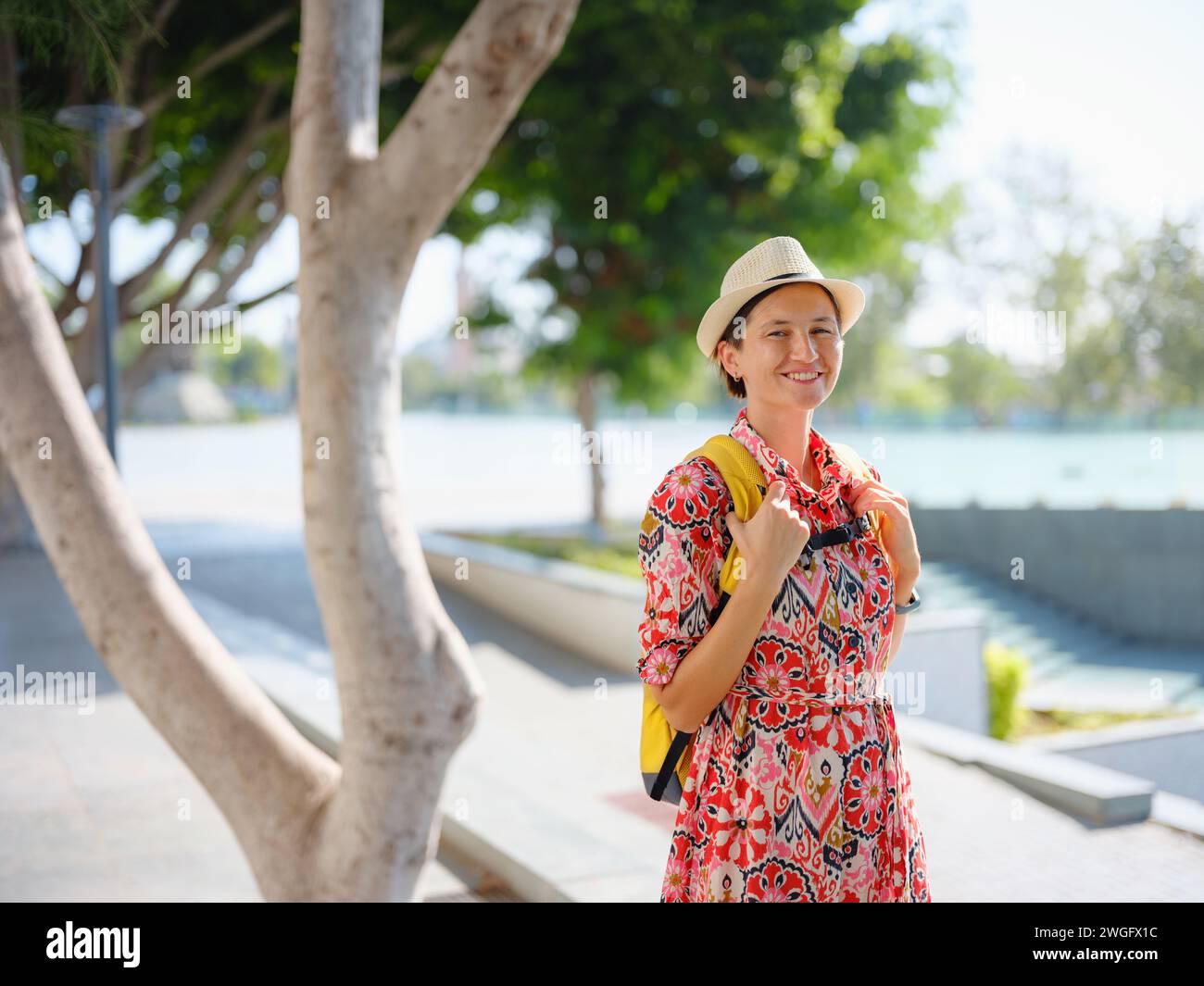 female summer travel to Antalya, Turkey. young asian woman in red dress ...