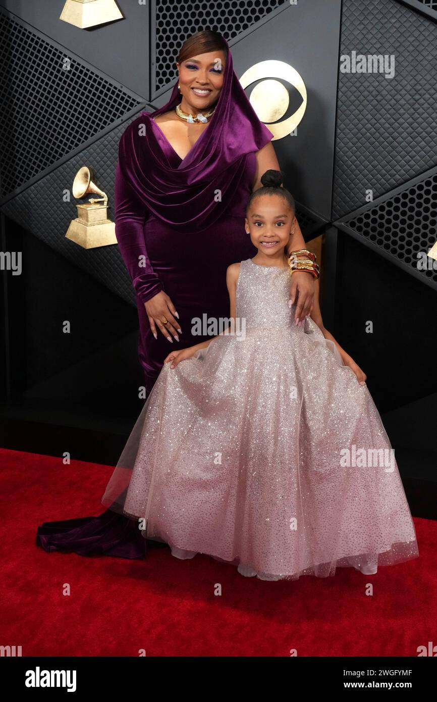 Alex Isley, left, and Isley-Rose arrive at the 66th annual Grammy ...