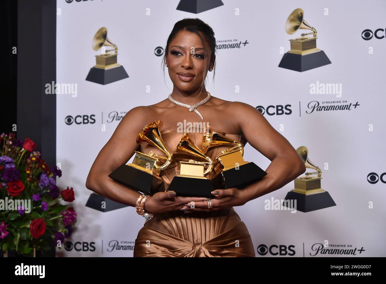Victoria Monet poses in the press room with the awards for best new ...