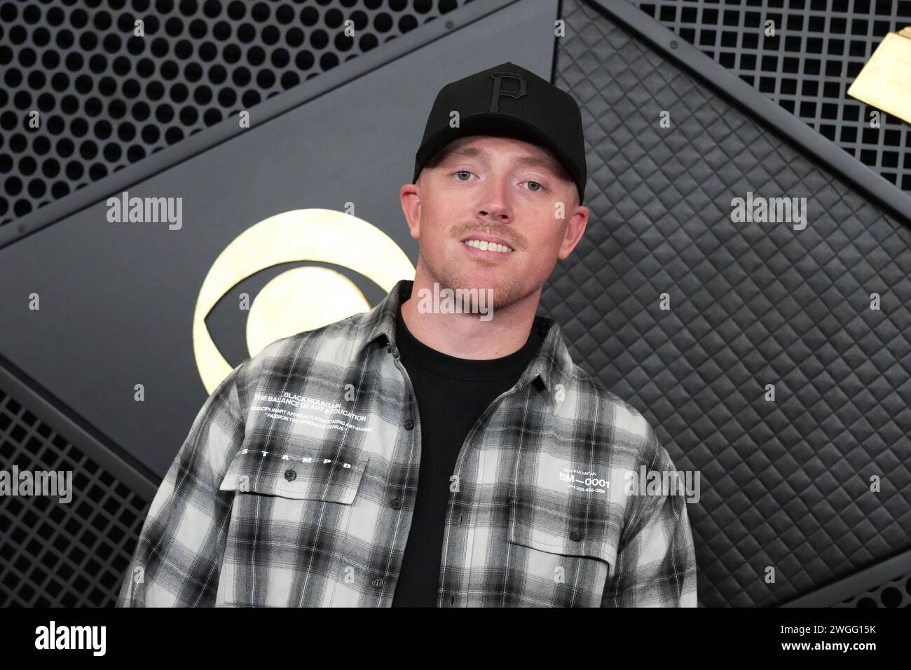 Tim Moore arrives at the 66th annual Grammy Awards on Sunday, Feb. 4 ...