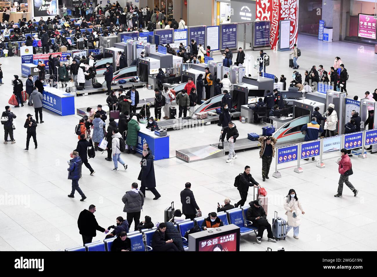 Passengers wait for their trains at Changchun railway station in ...