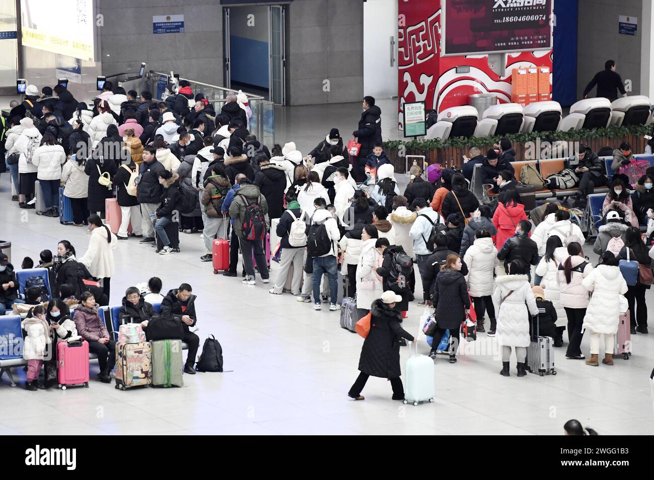 Passengers wait for their trains at Changchun railway station in ...