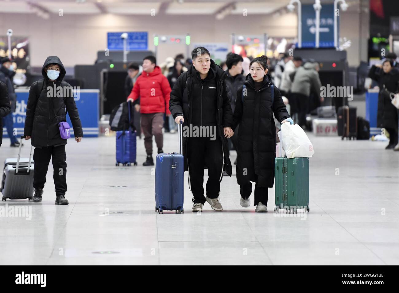 Passengers wait for their trains at Changchun railway station in ...