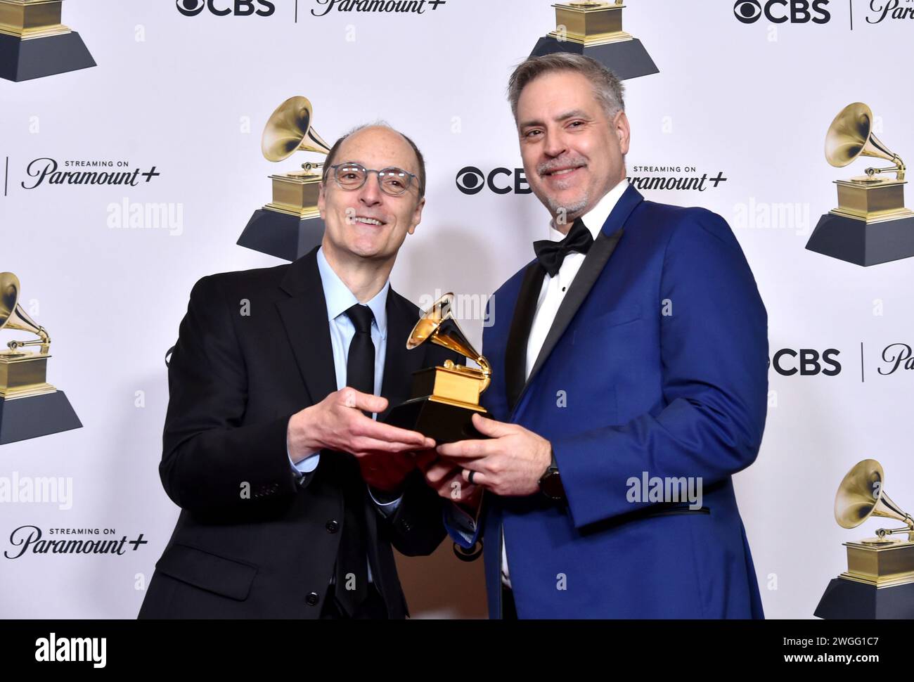 David Frost, left, and Charlie Post pose in the press room with the ...