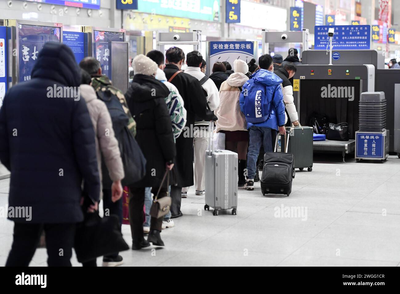 Passengers wait for their trains at Changchun railway station in ...