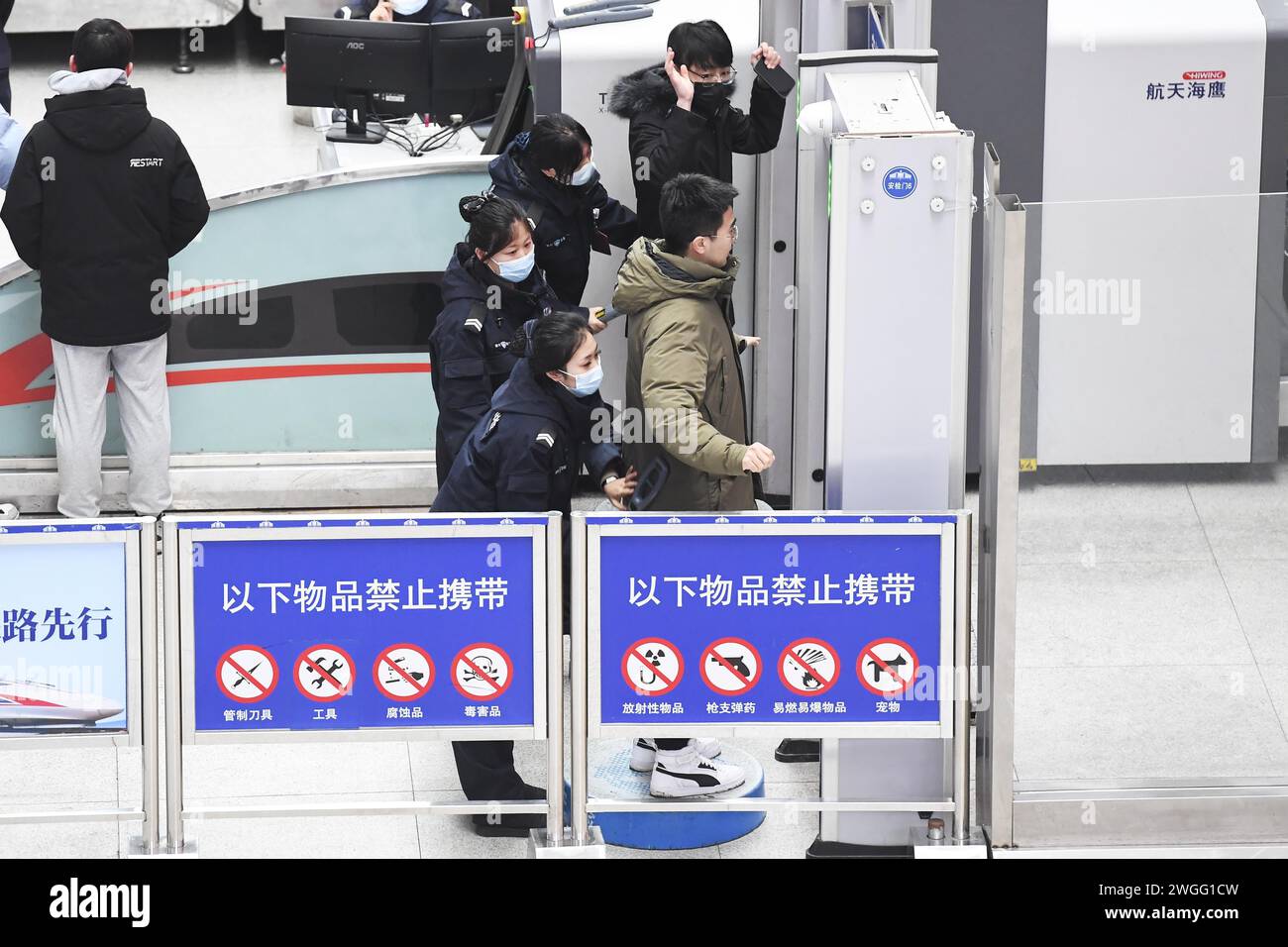 Passengers wait for their trains at Changchun railway station in ...