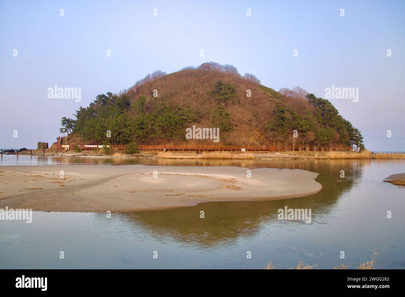 Samcheok City, South Korea - December 28, 2023: As the sun sets, stream ...