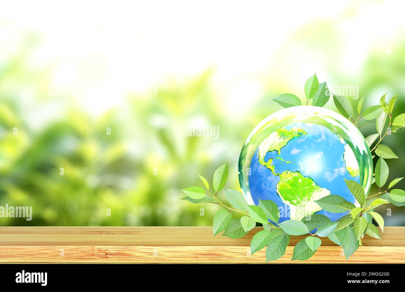 Horizontal banner with Earth in glass ball on green leaves. Ecology, go ...