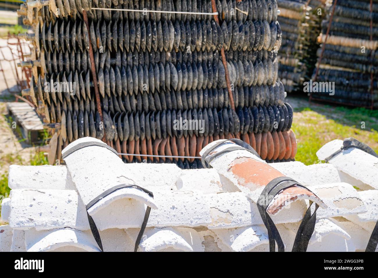 Equipment for raising oyster spat and white limed tiles and plastic ...