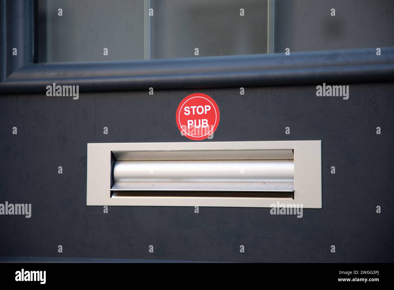 Mailbox with text sticker label written in French stop pub in concept ...