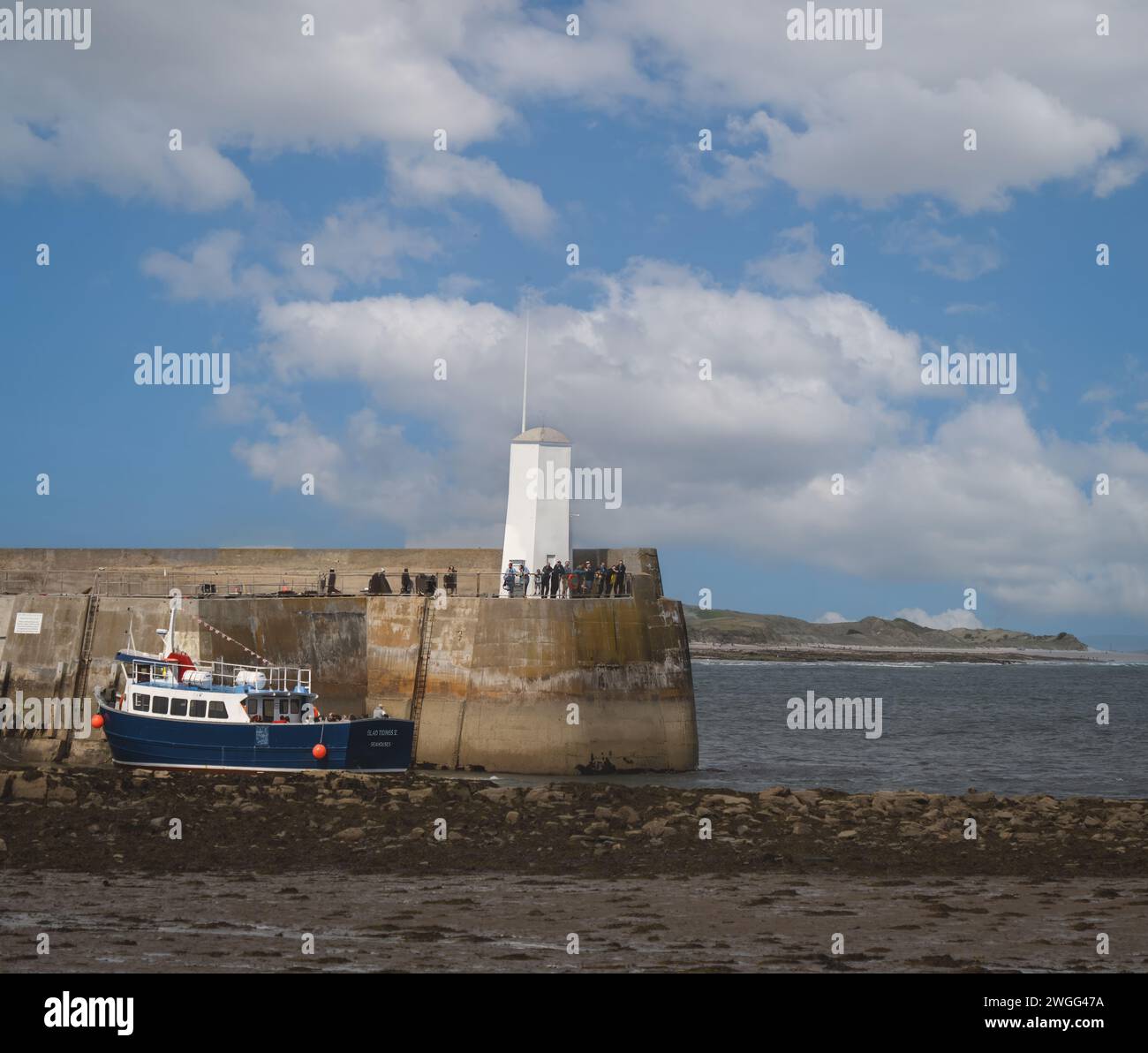 Lighthouse and fishing boat hi-res stock photography and images - Alamy
