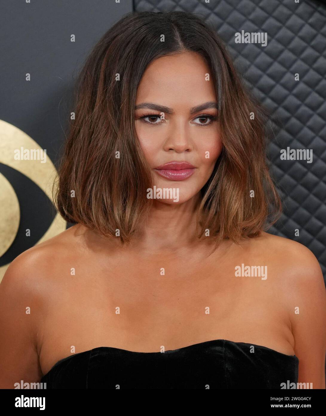 Chrissy Teigen arrives at the 66th Annual Grammy Awards held at the ...