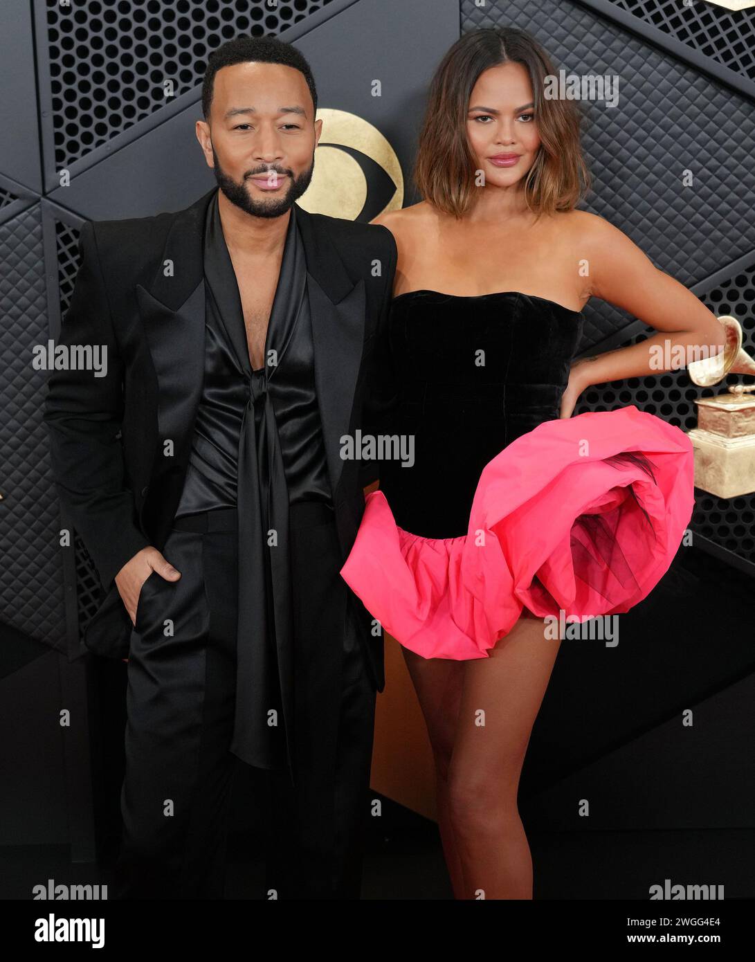 (L-R) John Legend and Chrissy Teigen arrives at the 66th Annual Grammy ...